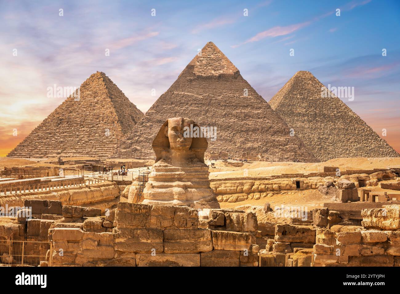 The Great Sphinx next to the Pyramids of Egypt in the sands of Giza ...