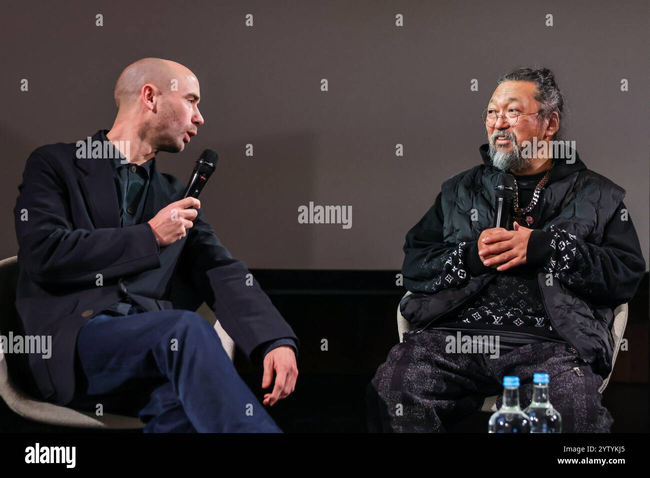 London, UK. 08th Dec, 2024. Artist Takashi Murakami with Sam Thorne, Director General & CEO of ...
