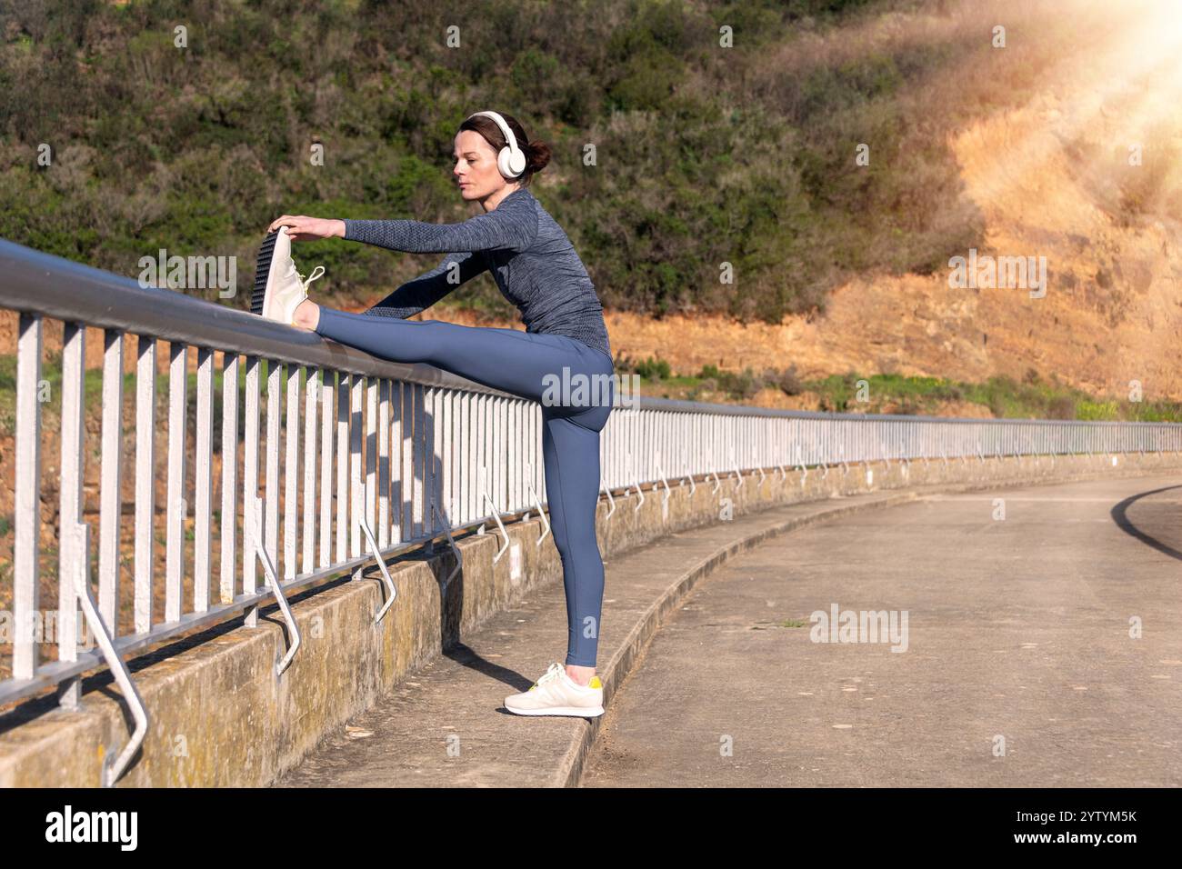 Woman doing leg exercise hi-res stock photography and images - Alamy