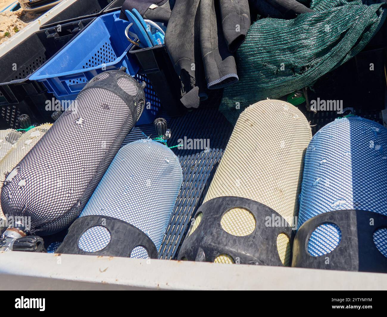 Diving oxygen cylinders carried on the back of the car Stock Photo - Alamy