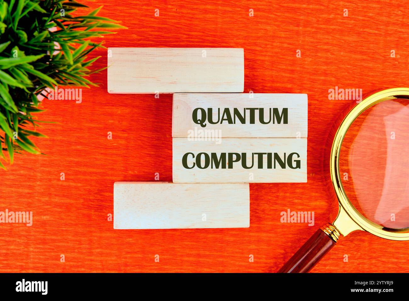 A display focuses on quantum computing, featuring wooden blocks ...