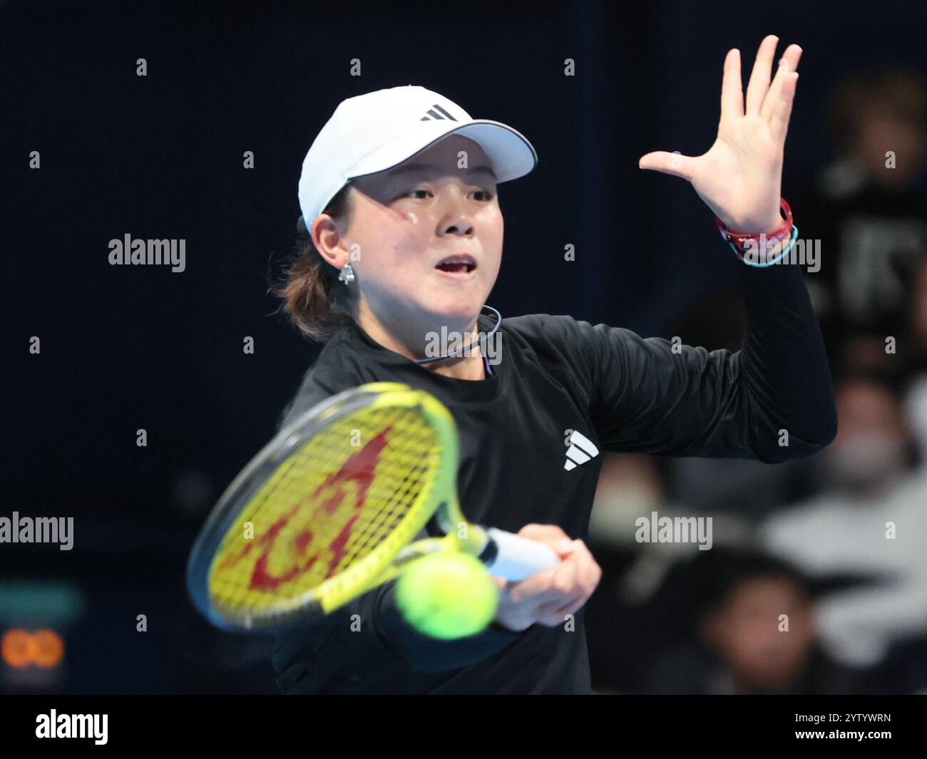 Tokyo, Japan. 8th Dec, 2024. Japanese young tennis player Ena Koike, 18, returns the ball ...
