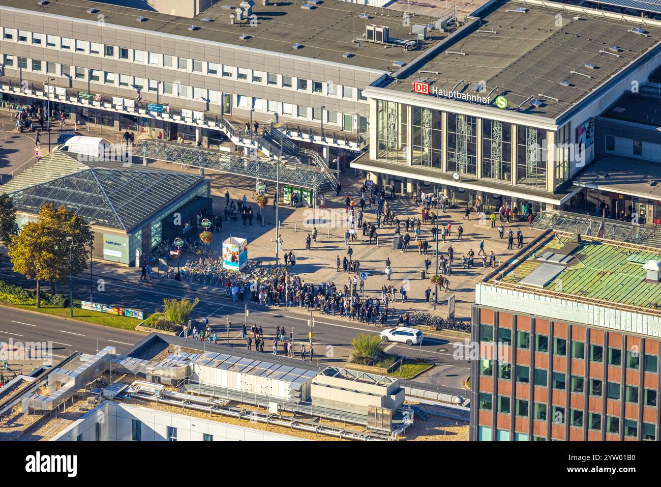 Aerial view, populated station forecourt at Dortmund main station ...