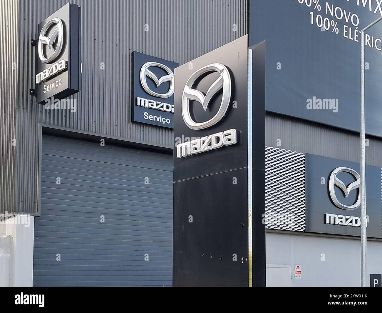 Modern mazda car dealership building displaying prominent branding and ...