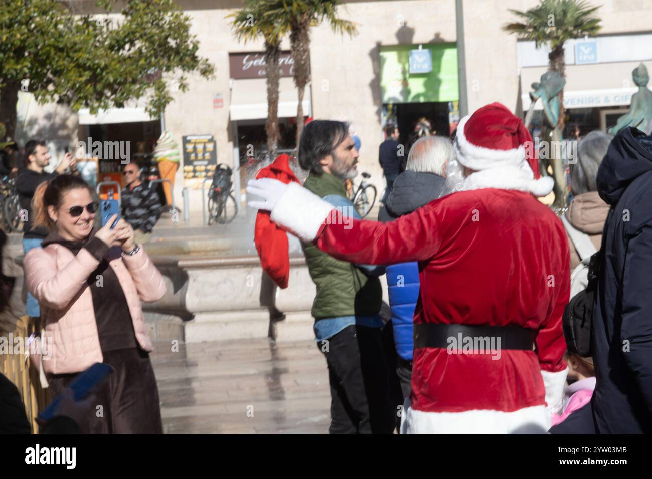 An actor dressed as Santa Claus in Valencia Stock Photo - Alamy