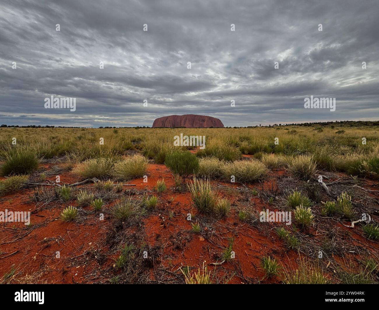 A wide angle iPhone photograph of Ayers Rock in the Australian Outback ...