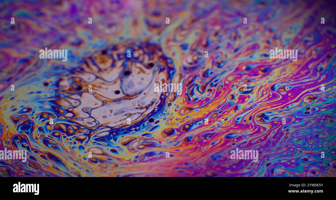 Oil dye. Fluid bubble. Defocused multicolor purple green liquid paint ...