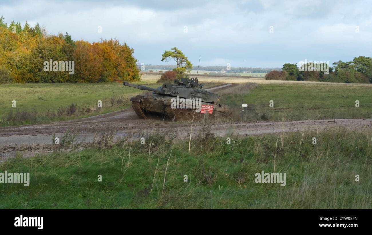 close-up of commander and gunner directing a british army challenger ii ...
