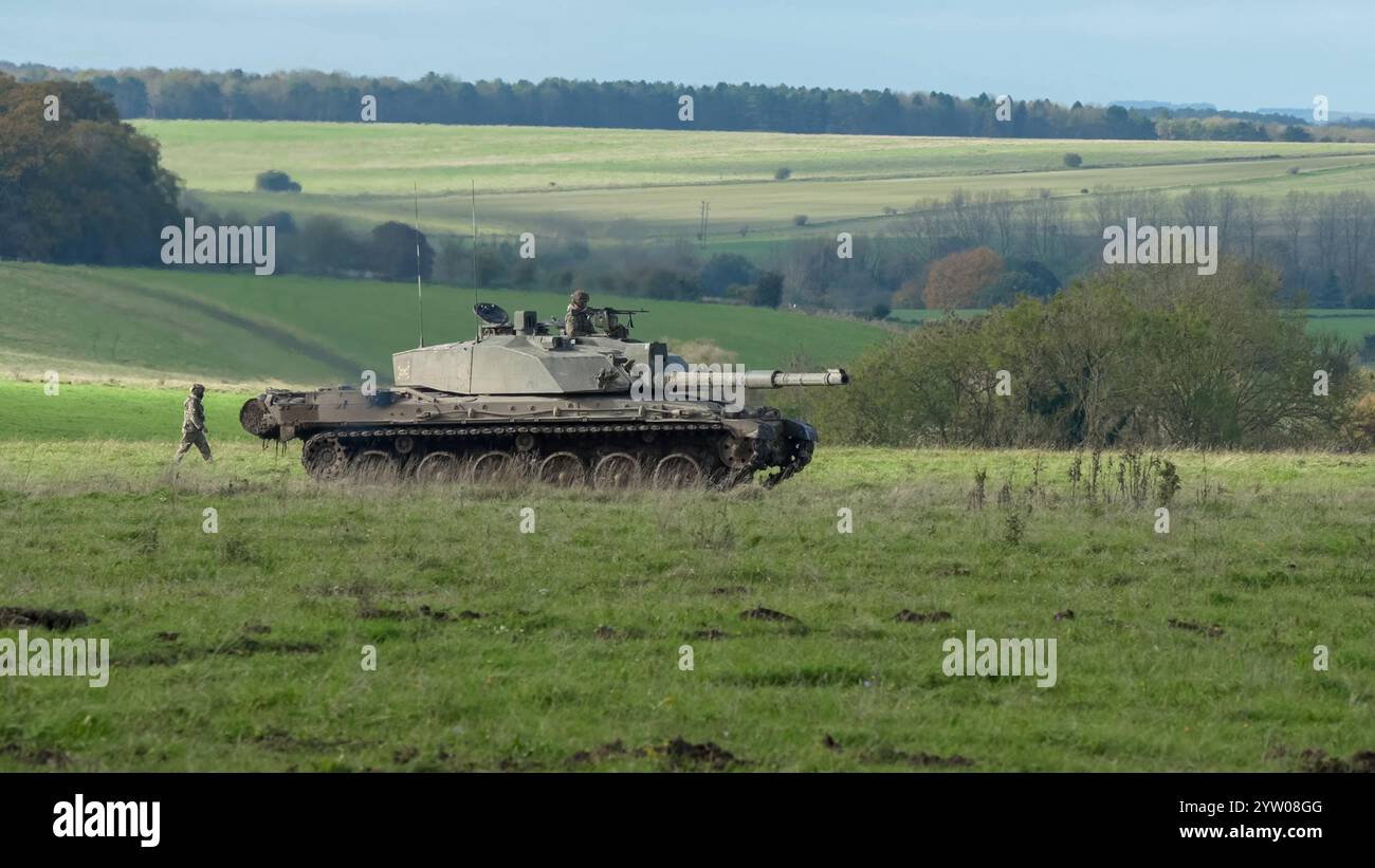 close-up of commander and gunner directing a british army challenger ii ...