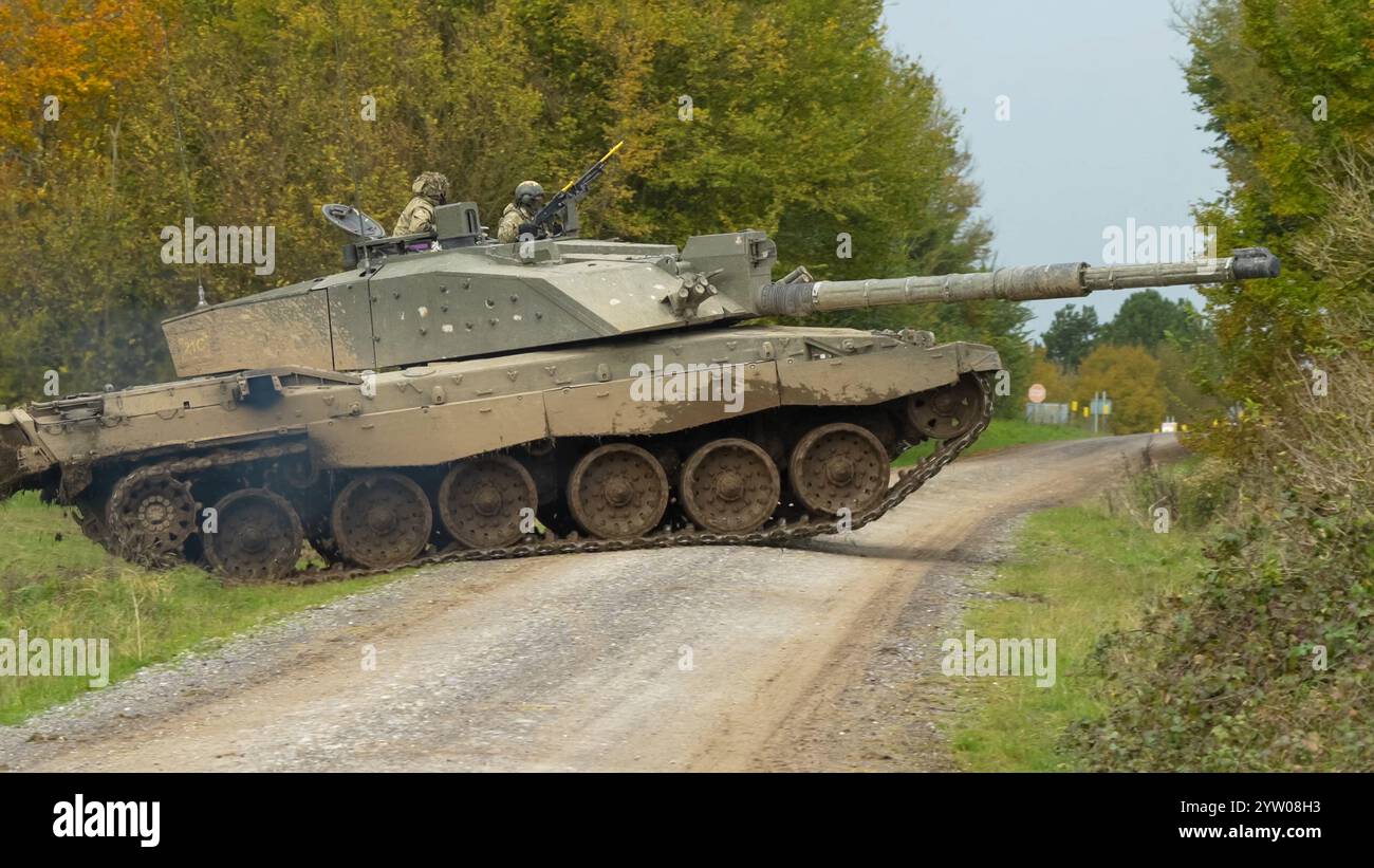 close-up of commander and gunner directing a british army challenger ii ...