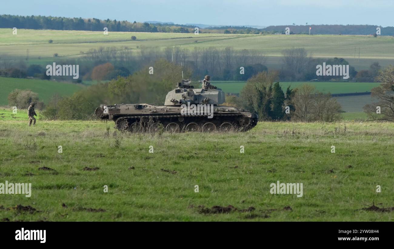 close-up of commander and gunner directing a british army challenger ii ...
