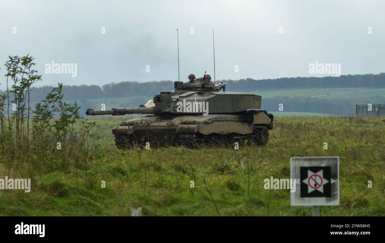 close-up of commander and gunner directing a british army challenger ii ...