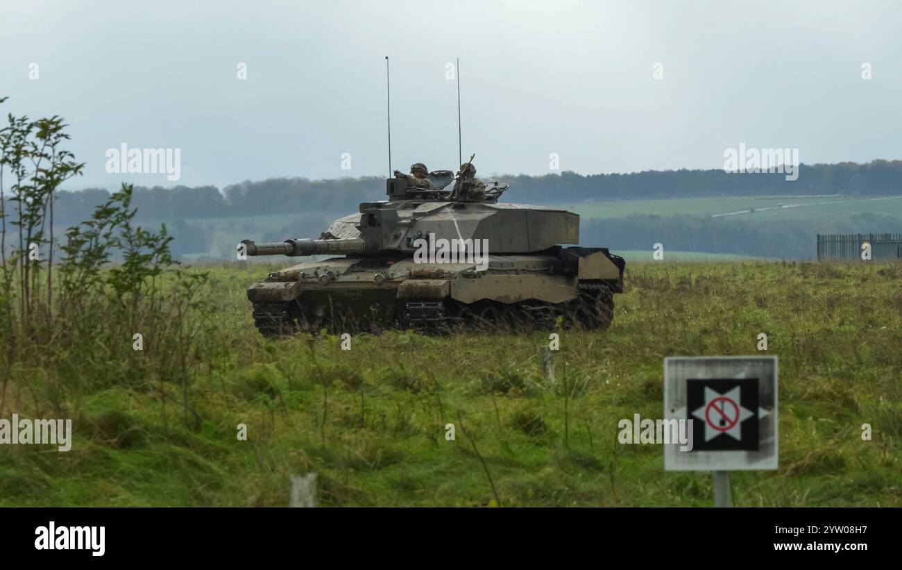 close-up of commander and gunner directing a british army challenger ii ...