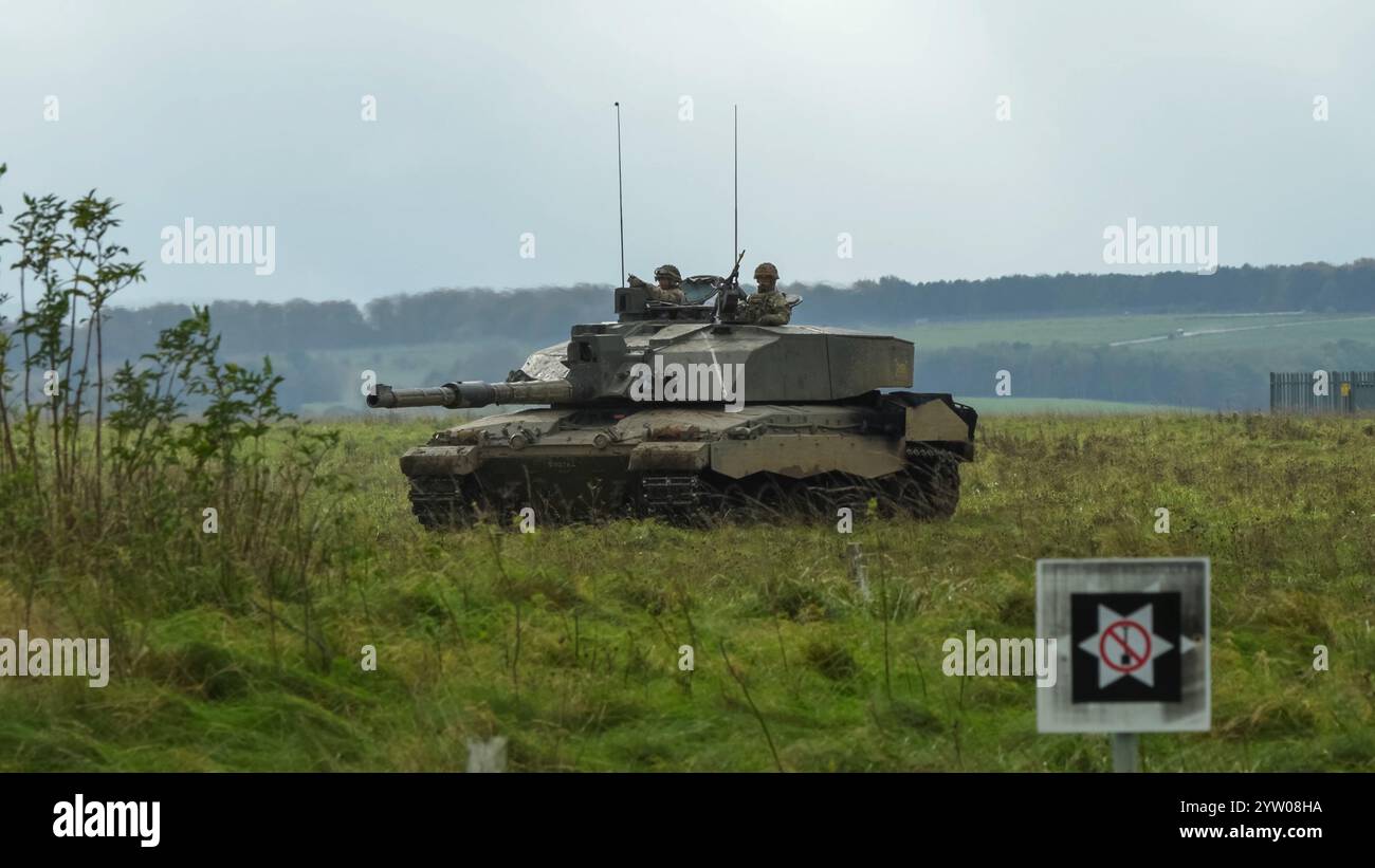 close-up of commander and gunner directing a british army challenger ii ...