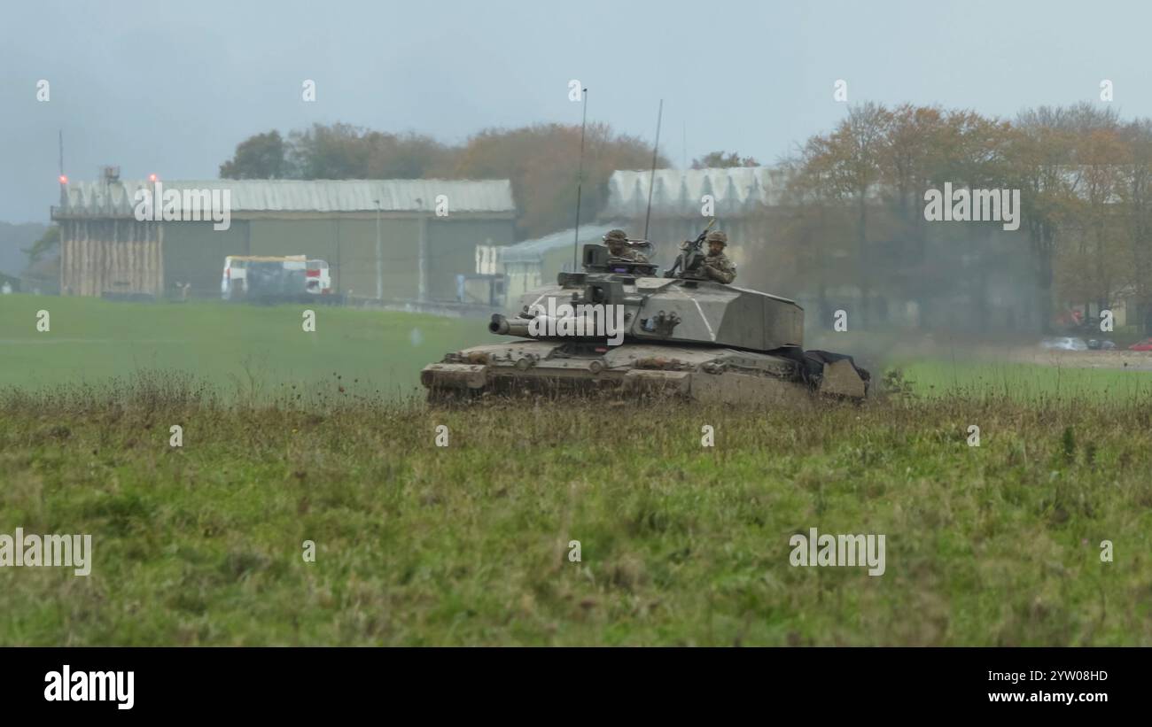 close-up of commander and gunner directing a british army challenger ii ...