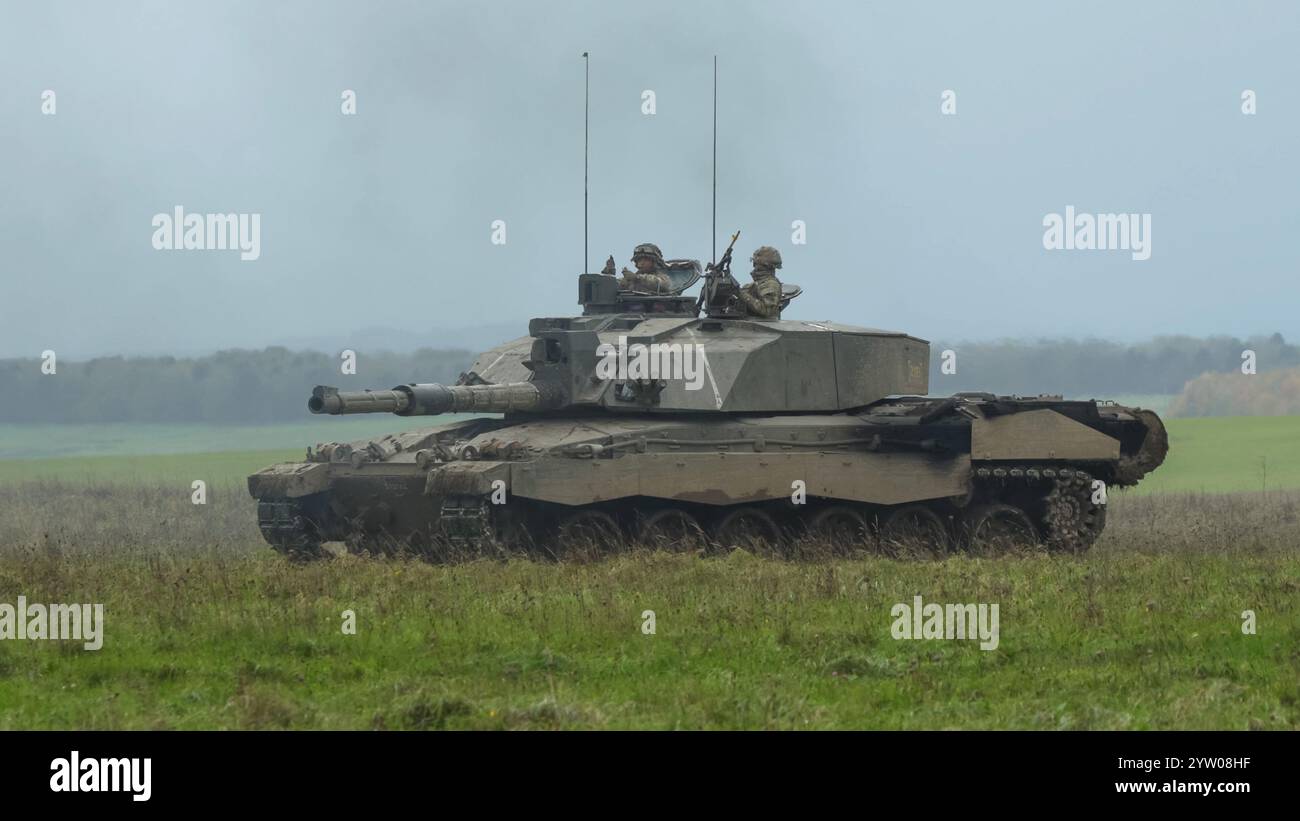 close-up of commander and gunner directing a british army challenger ii ...