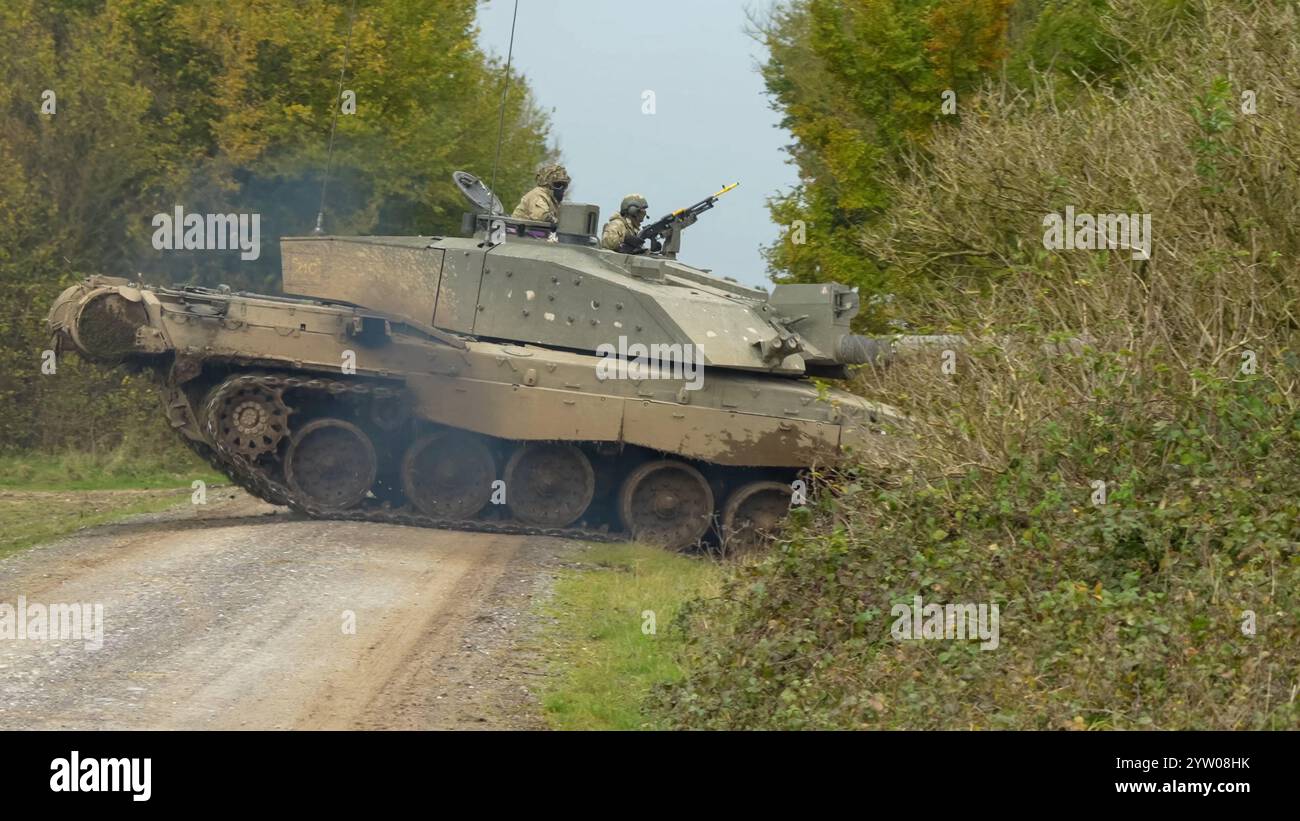 close-up of commander and gunner directing a british army challenger ii ...