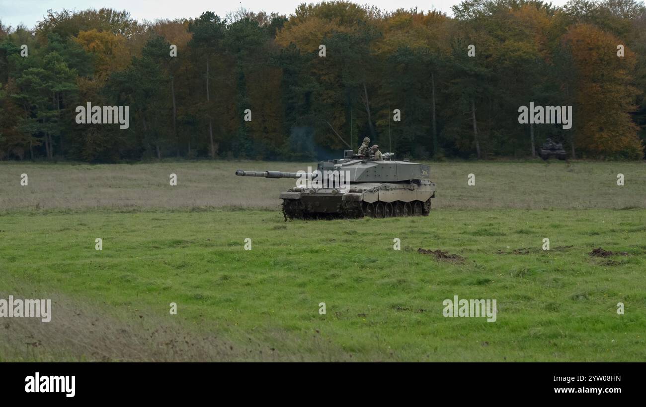 close-up of commander and gunner directing a british army challenger ii ...