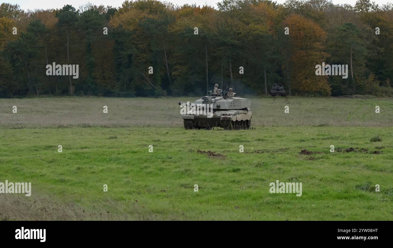 close-up of commander and gunner directing a british army challenger ii ...