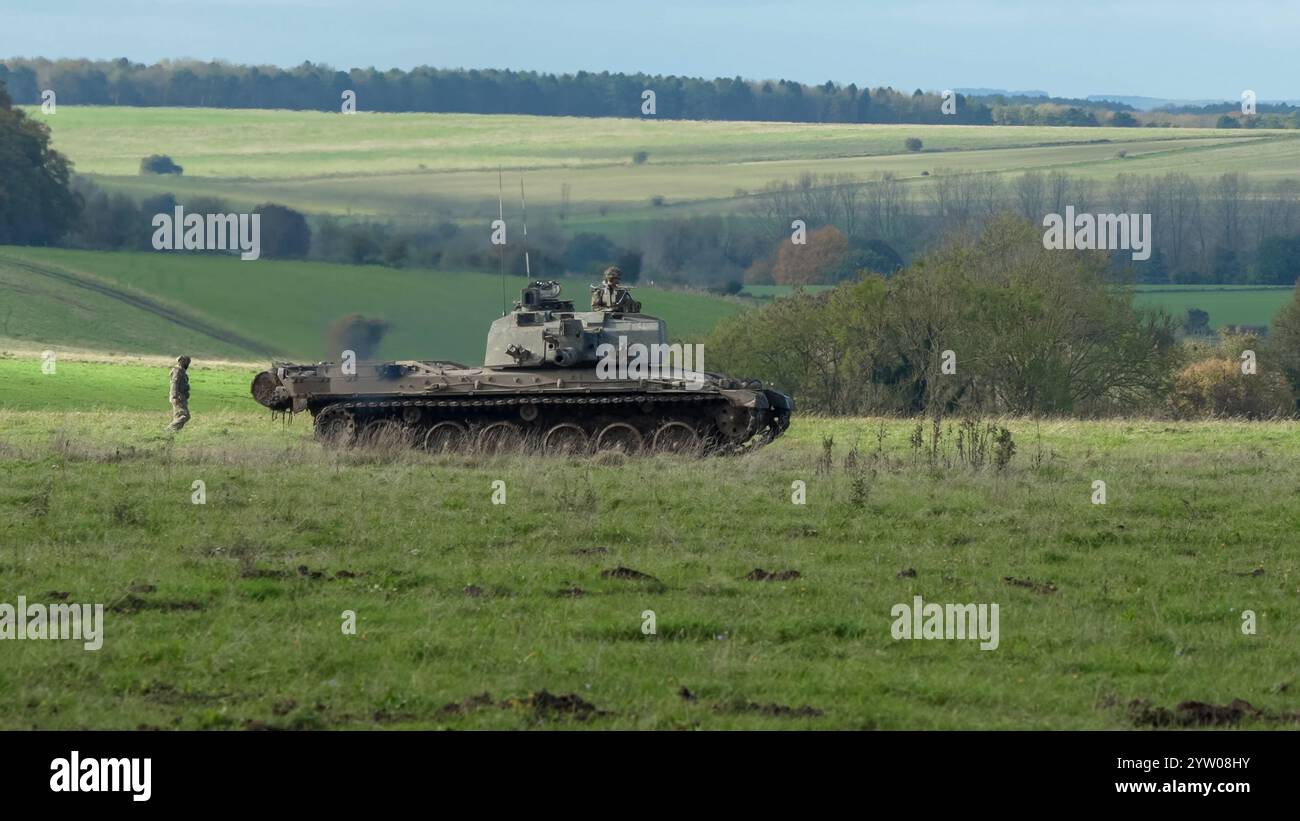 close-up of commander and gunner directing a british army challenger ii ...