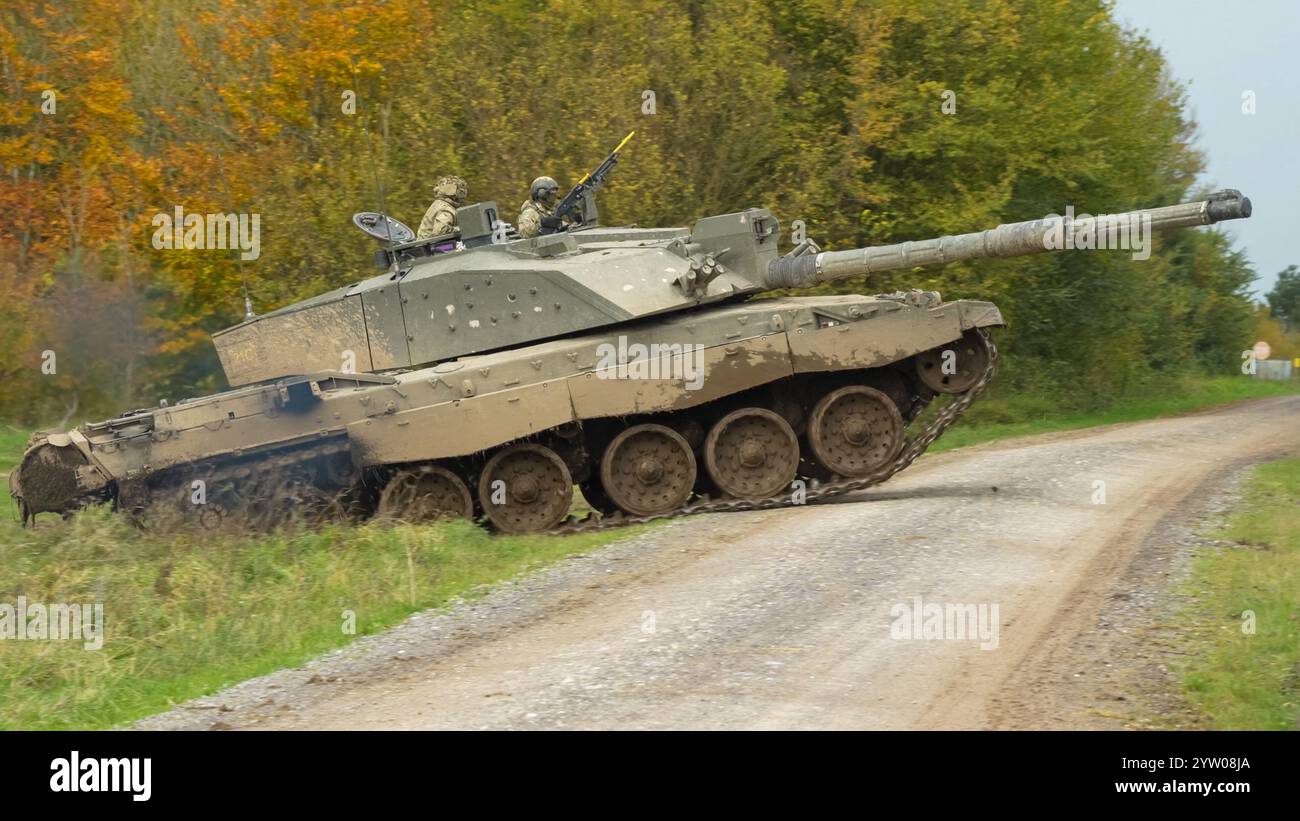 close-up of commander and gunner directing a british army challenger ii ...