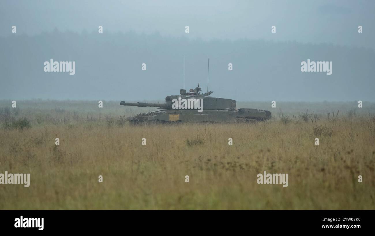 close-up of commander and gunner directing a british army challenger ii ...