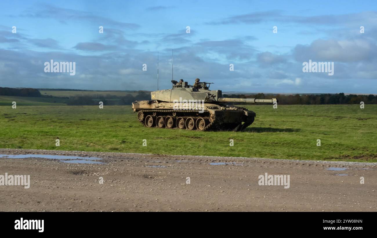 close-up of commander and gunner directing a british army challenger ii ...