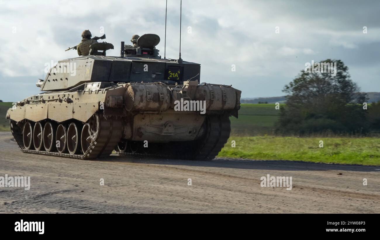 close-up of commander and gunner directing a british army challenger ii ...