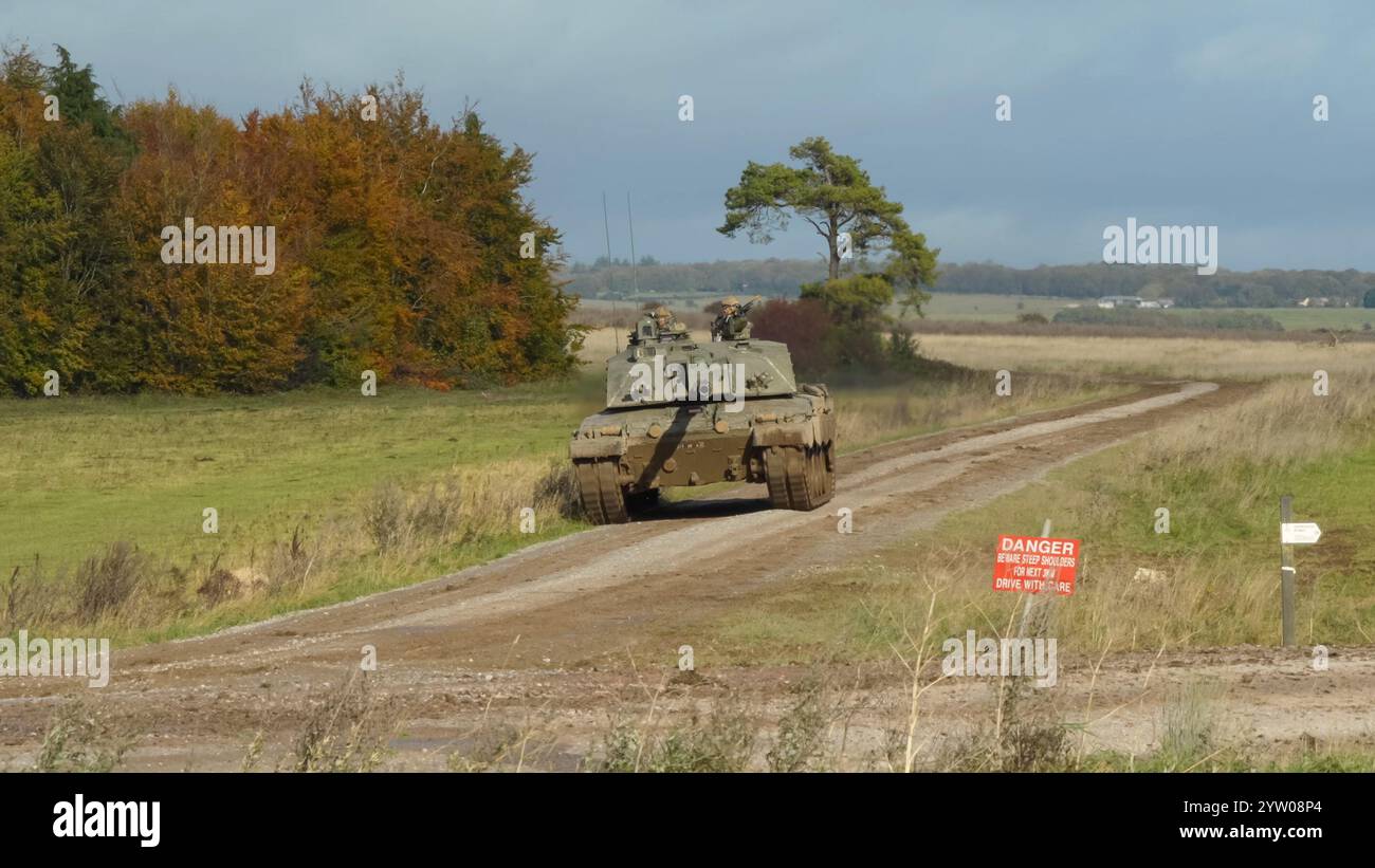 close-up of commander and gunner directing a british army challenger ii ...