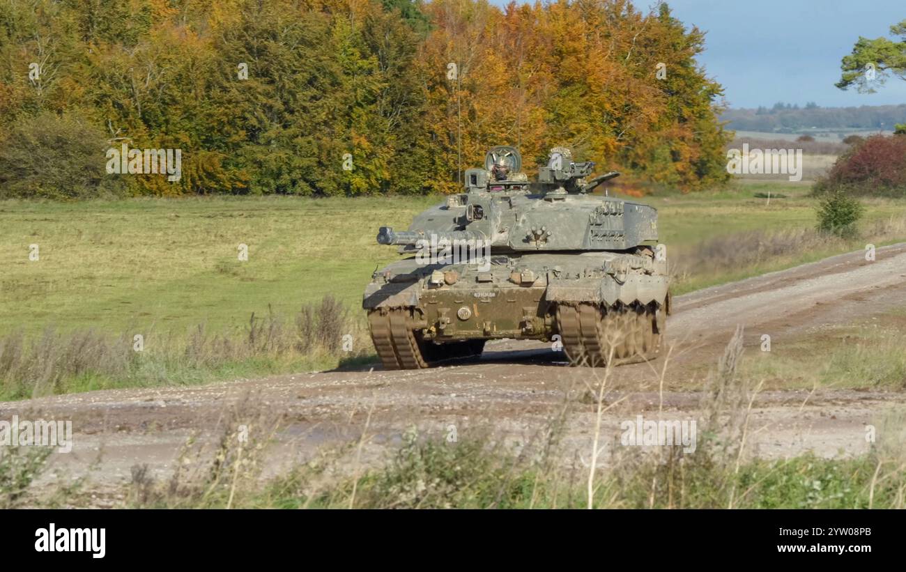 close-up of commander and gunner directing a british army challenger ii ...