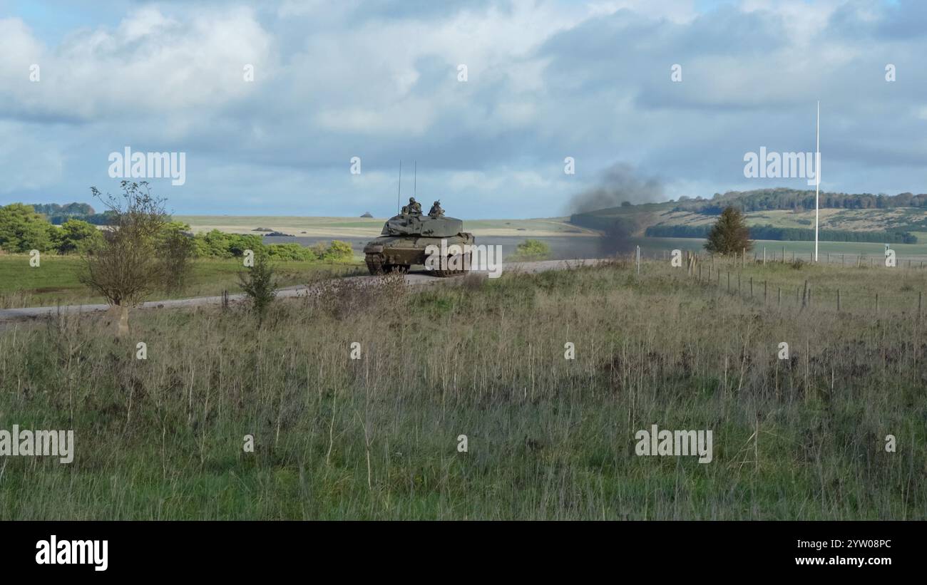 close-up of commander and gunner directing a british army challenger ii ...