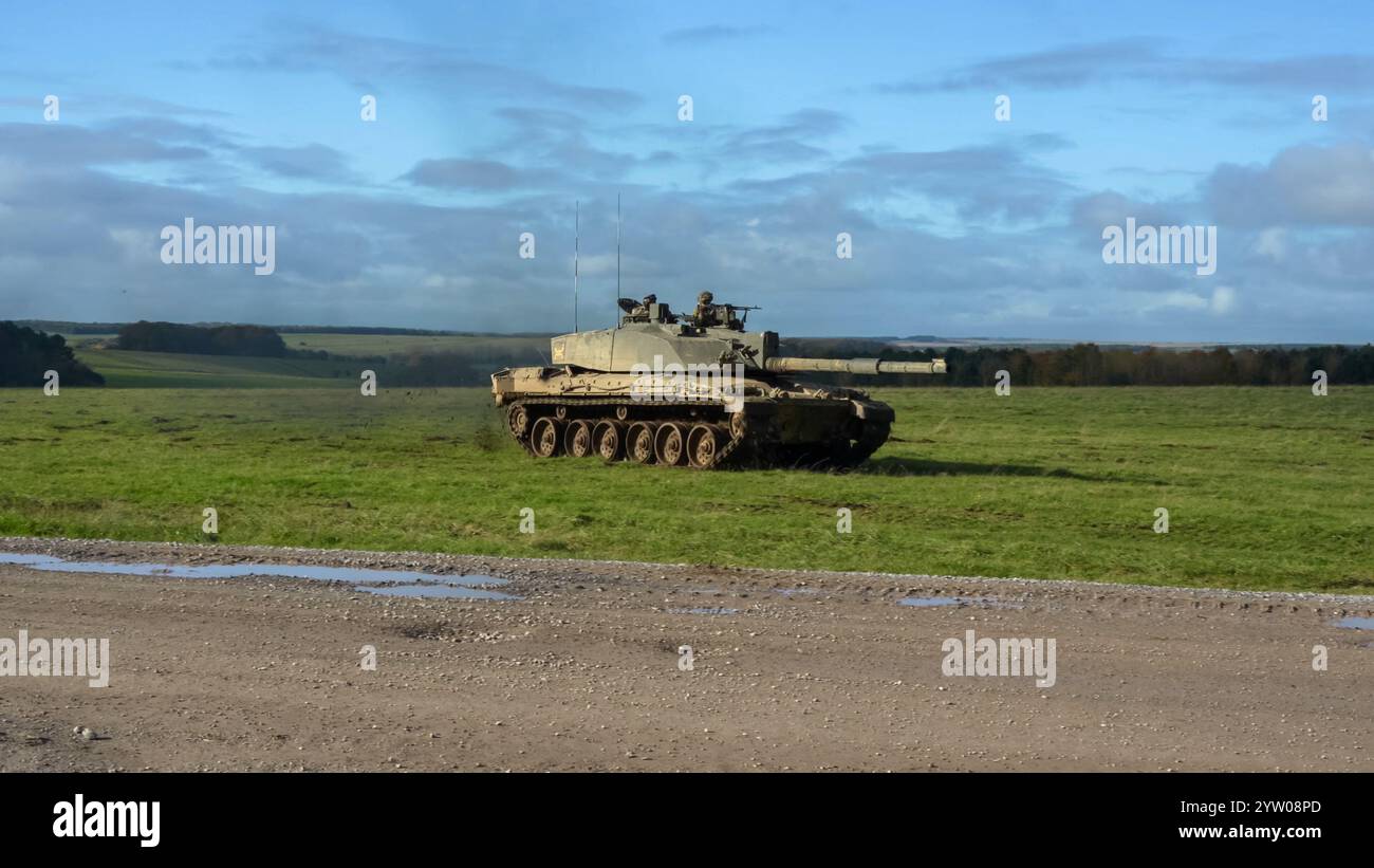 close-up of commander and gunner directing a british army challenger ii ...