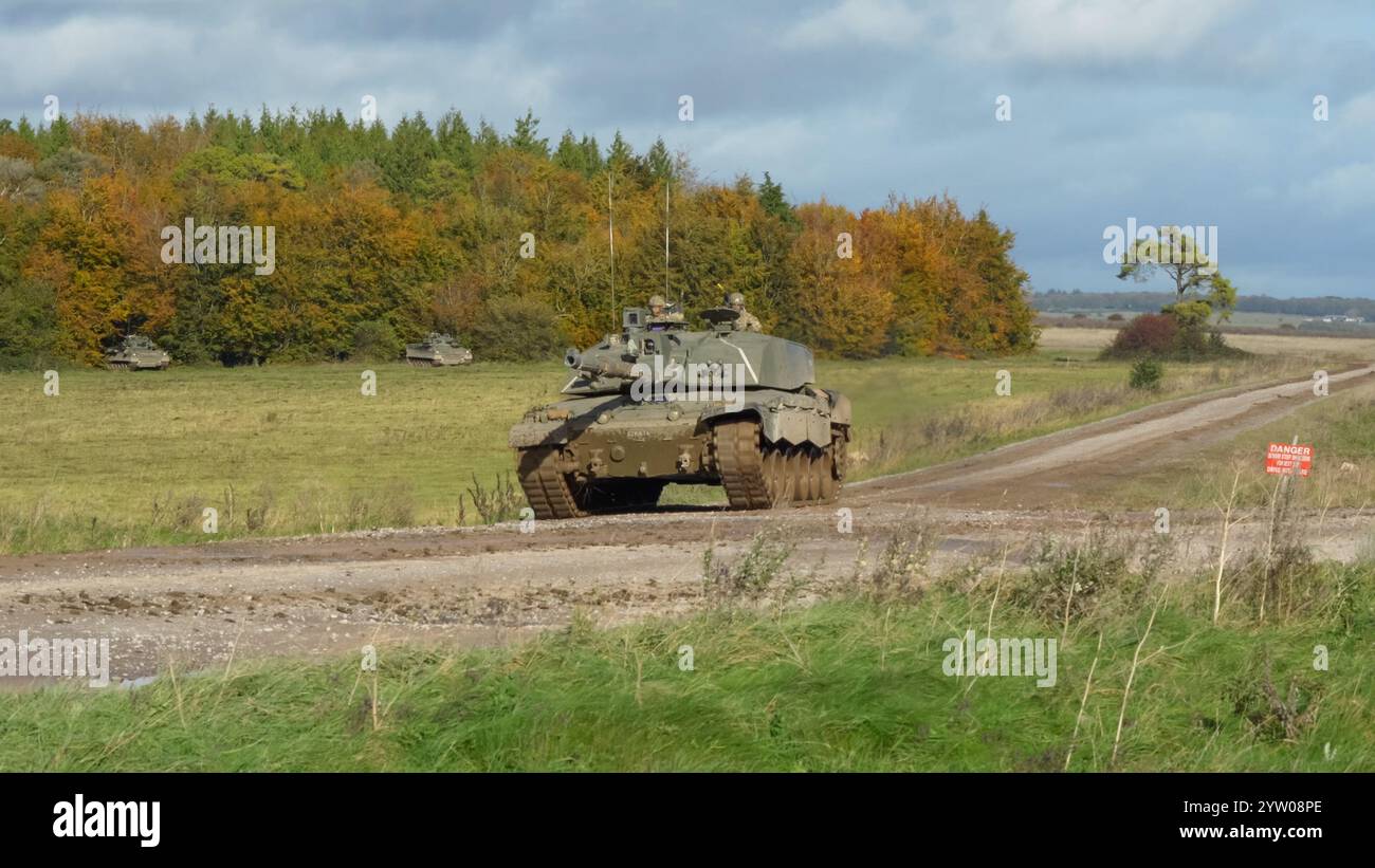 close-up of commander and gunner directing a british army challenger ii ...