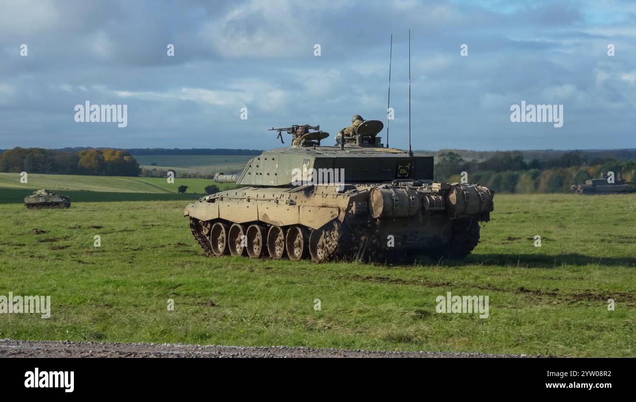 close-up of commander and gunner directing a british army challenger ii ...