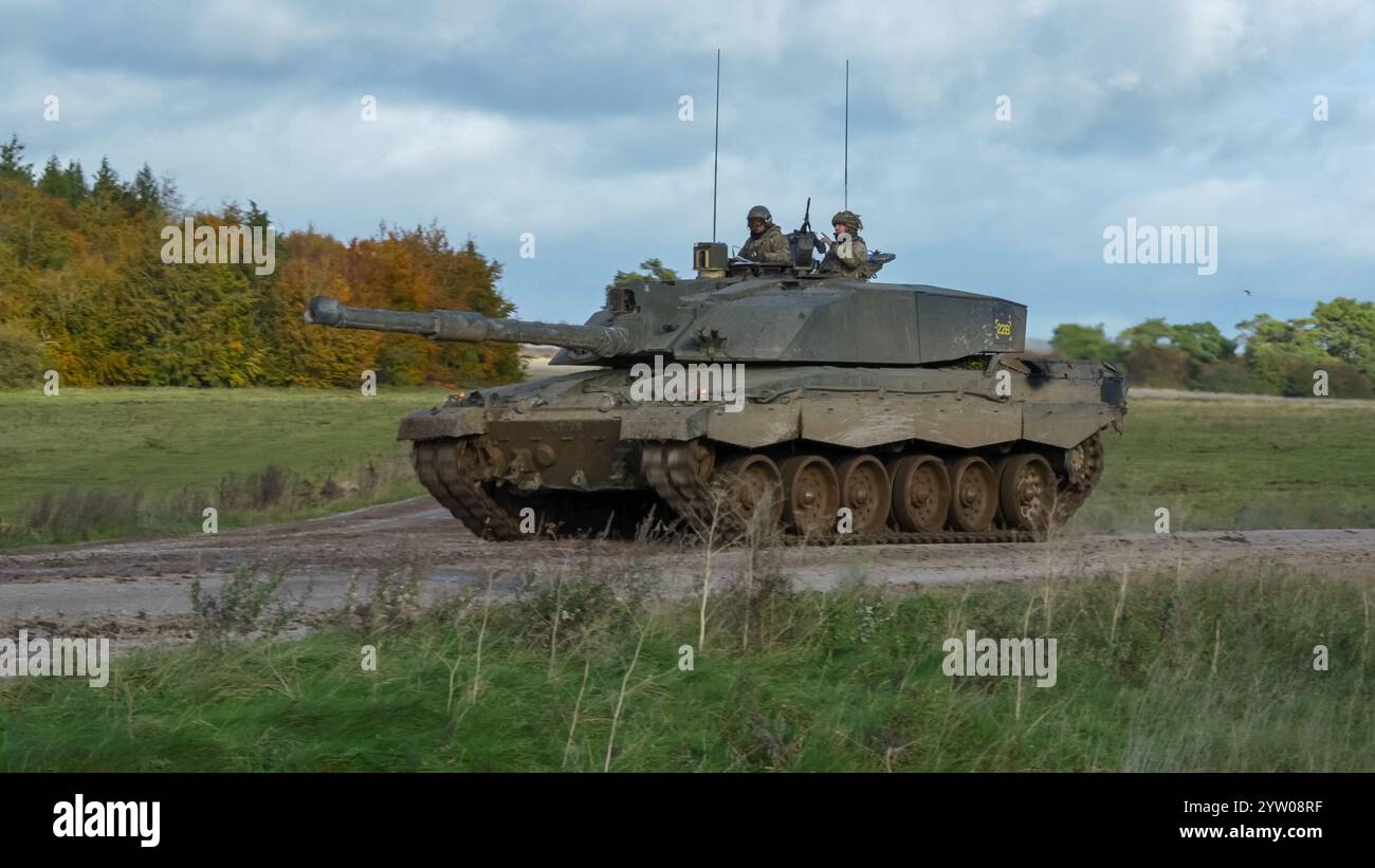 close-up of commander and gunner directing a british army challenger ii ...