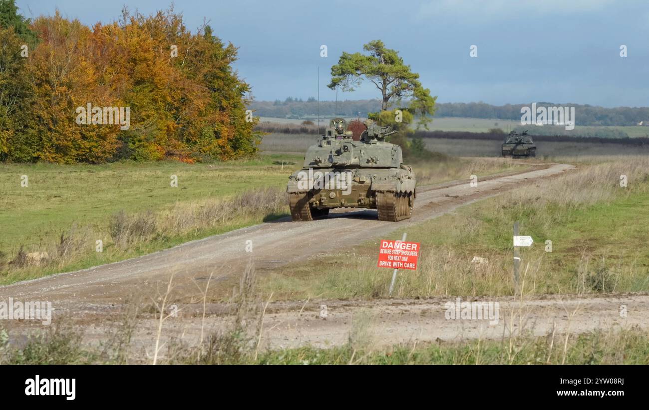 close-up of commander and gunner directing a british army challenger ii ...