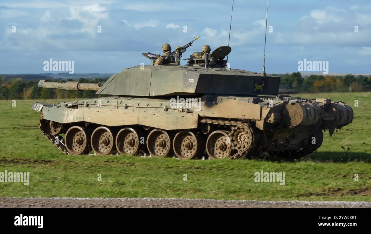close-up of commander and gunner directing a british army challenger ii ...