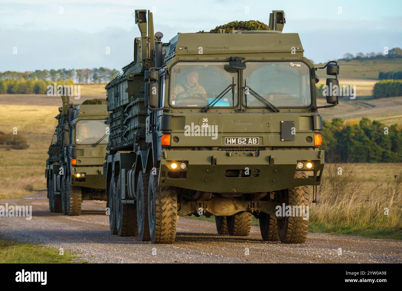 Convoy of British army MAN SV 8x8 EPLS and HX utility logistics trucks ...