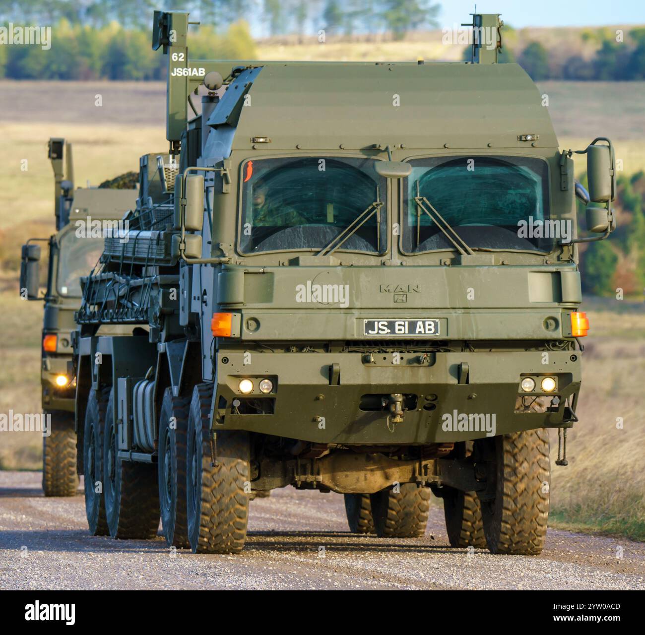 Convoy of British army MAN SV 8x8 EPLS and HX utility logistics trucks ...
