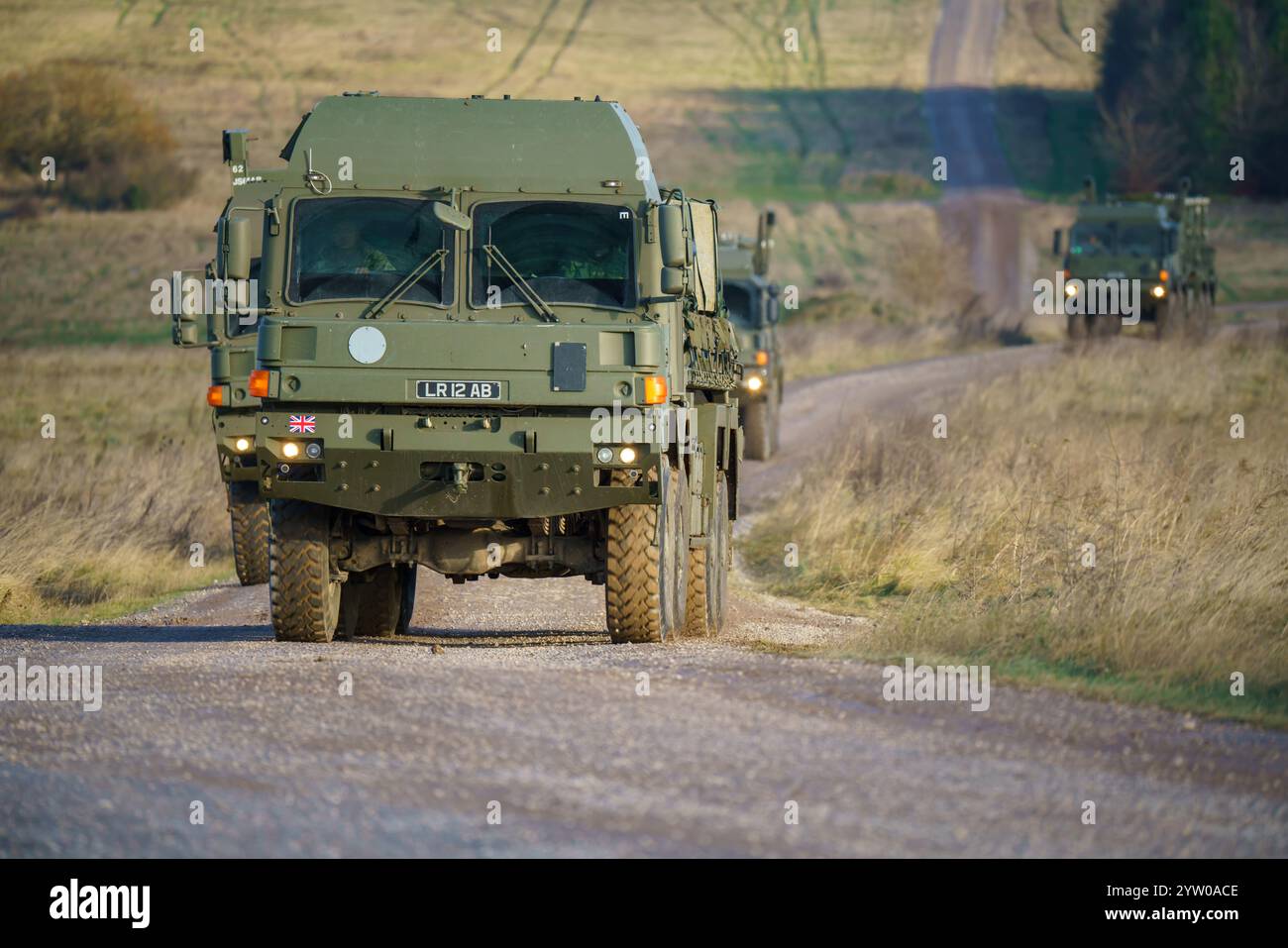 Convoy of British army MAN SV 8x8 EPLS and HX utility logistics trucks ...