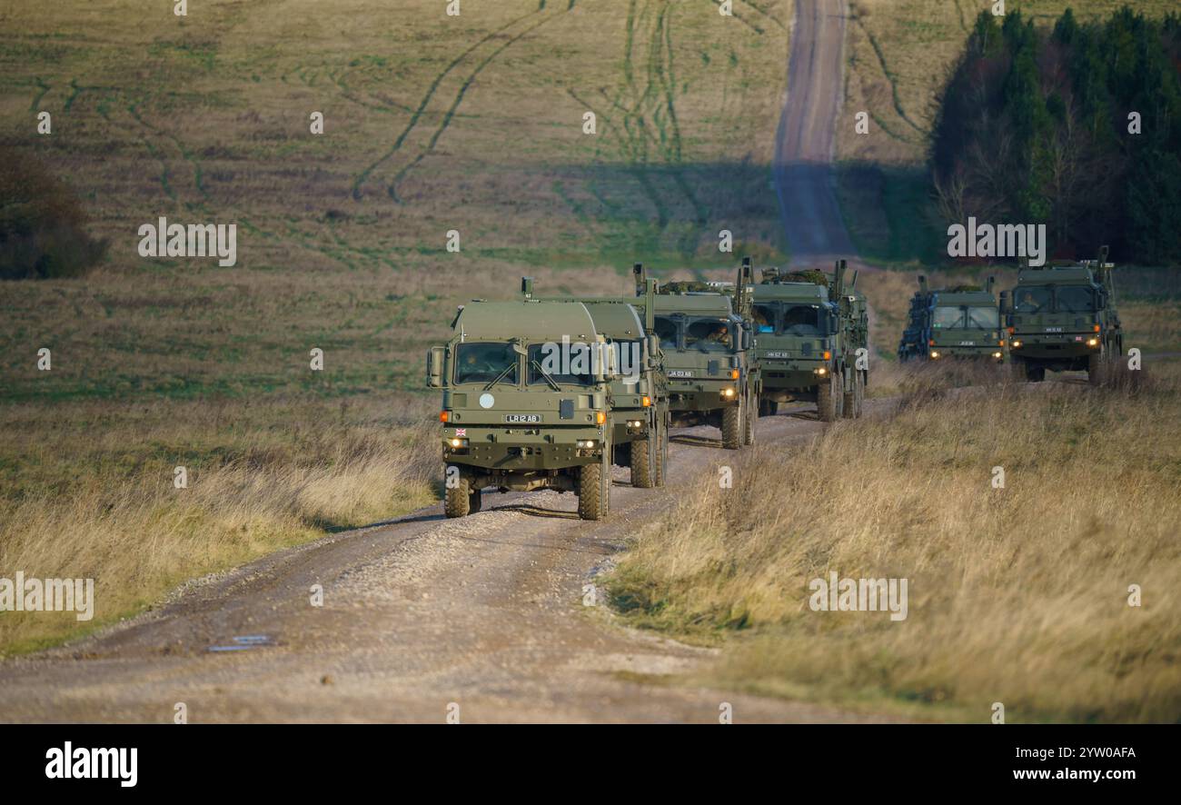 Convoy of British army MAN SV 8x8 EPLS and HX utility logistics trucks ...