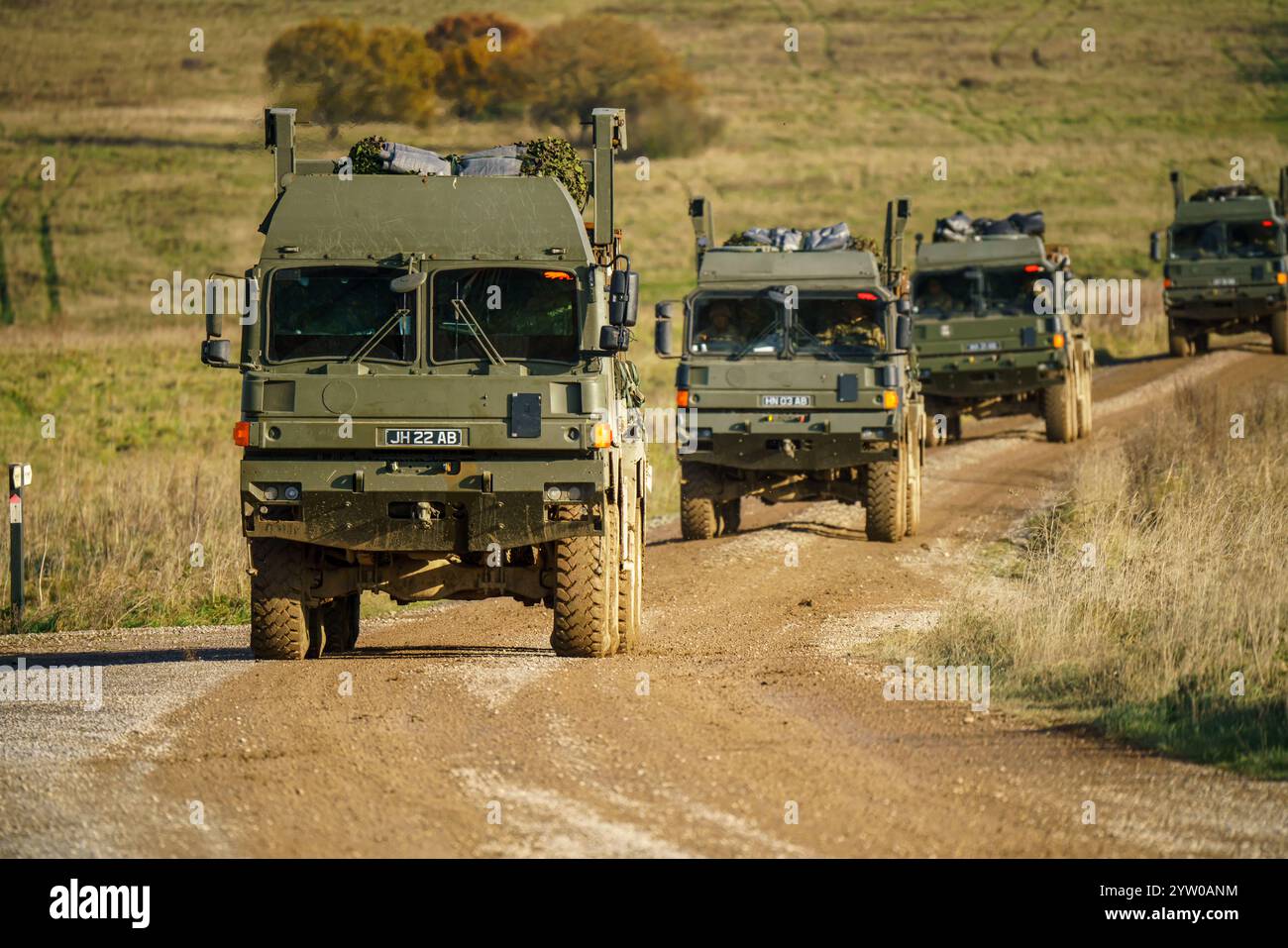 Convoy of British army MAN SV 8x8 EPLS and HX utility logistics trucks ...