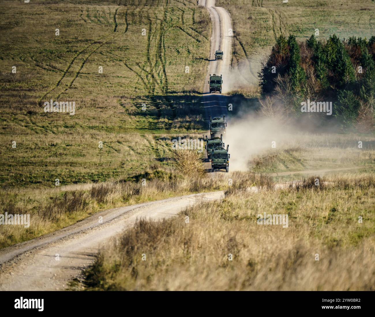 Convoy of British army MAN SV 8x8 EPLS and HX utility logistics trucks ...