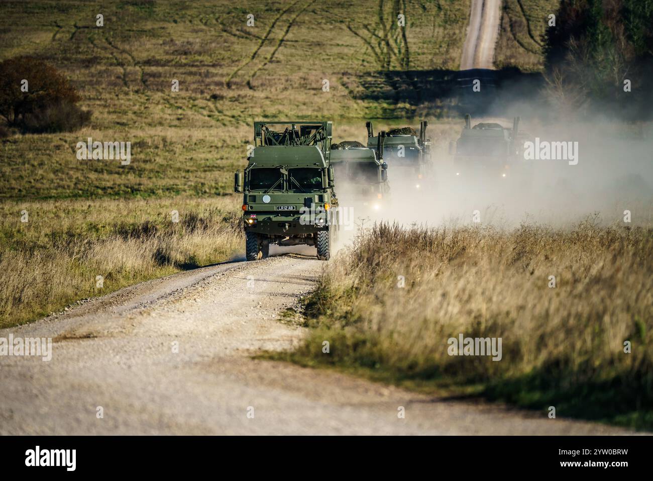 Convoy of British army MAN SV 8x8 EPLS and HX utility logistics trucks ...