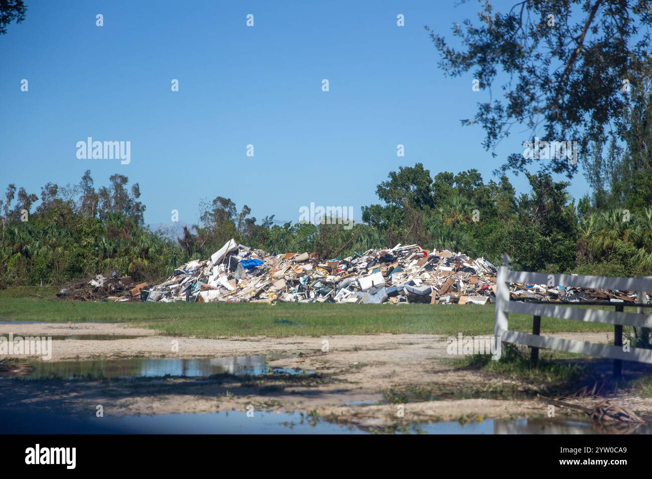 Trash and debris dump after several storms Stock Photo - Alamy