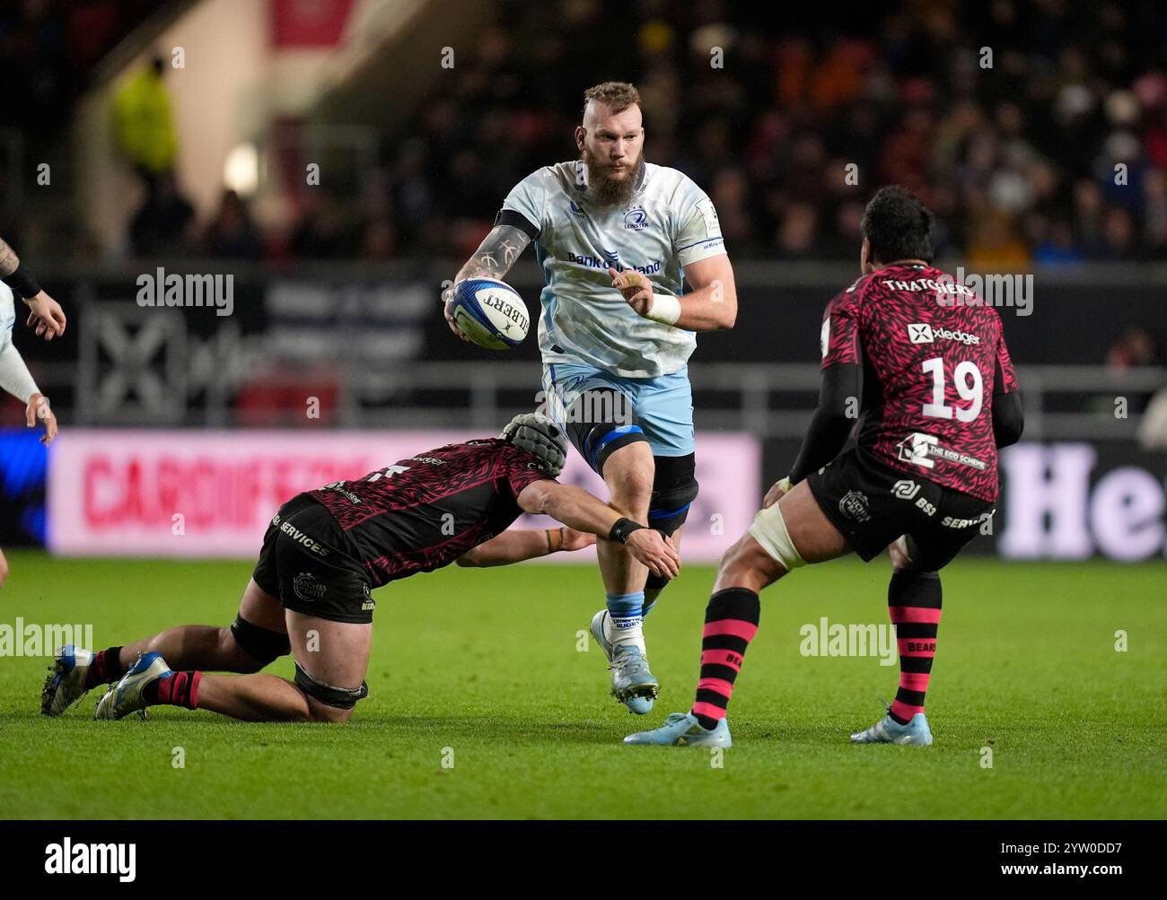 Leinster's RG Snyman (centre) is tackled by Bristol Bears' Fitz Harding ...