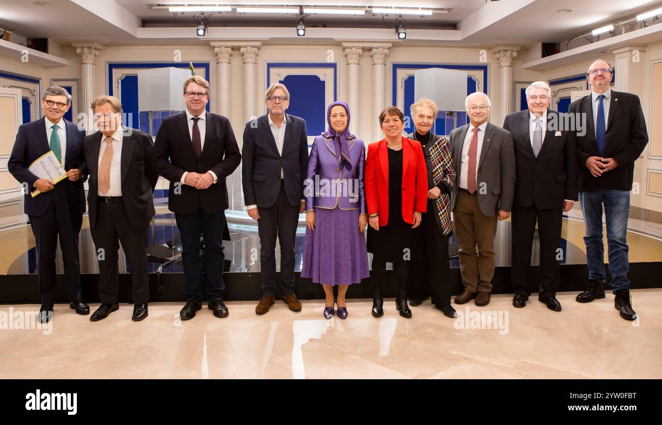 Speakers of the meeting pose for a picture. From left, Hans-Ulrich ...