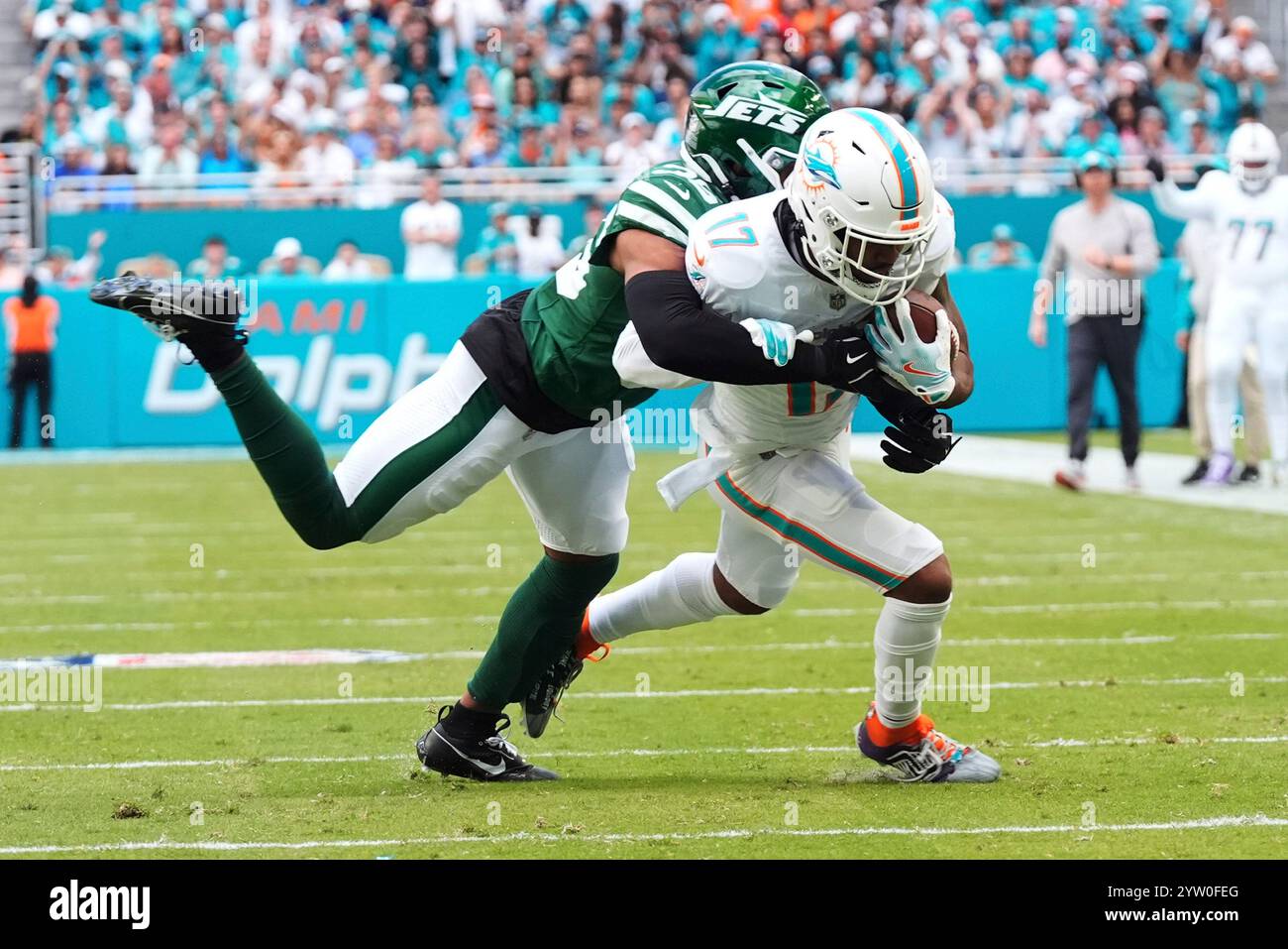 New York Jets safety Chuck Clark (36) tackles Miami Dolphins wide ...