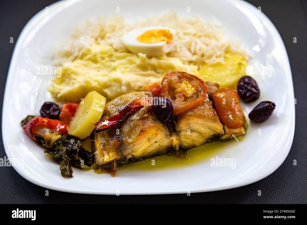 Traditional cod recipe prepared in the classic style Stock Photo - Alamy