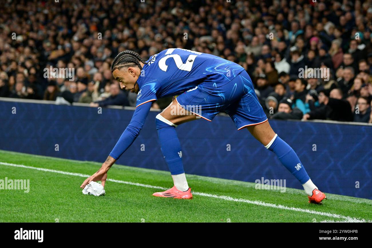 London, UK. 8th Dec, 2024. Malo Gusto (Chelsea) clears rubbish from the ...